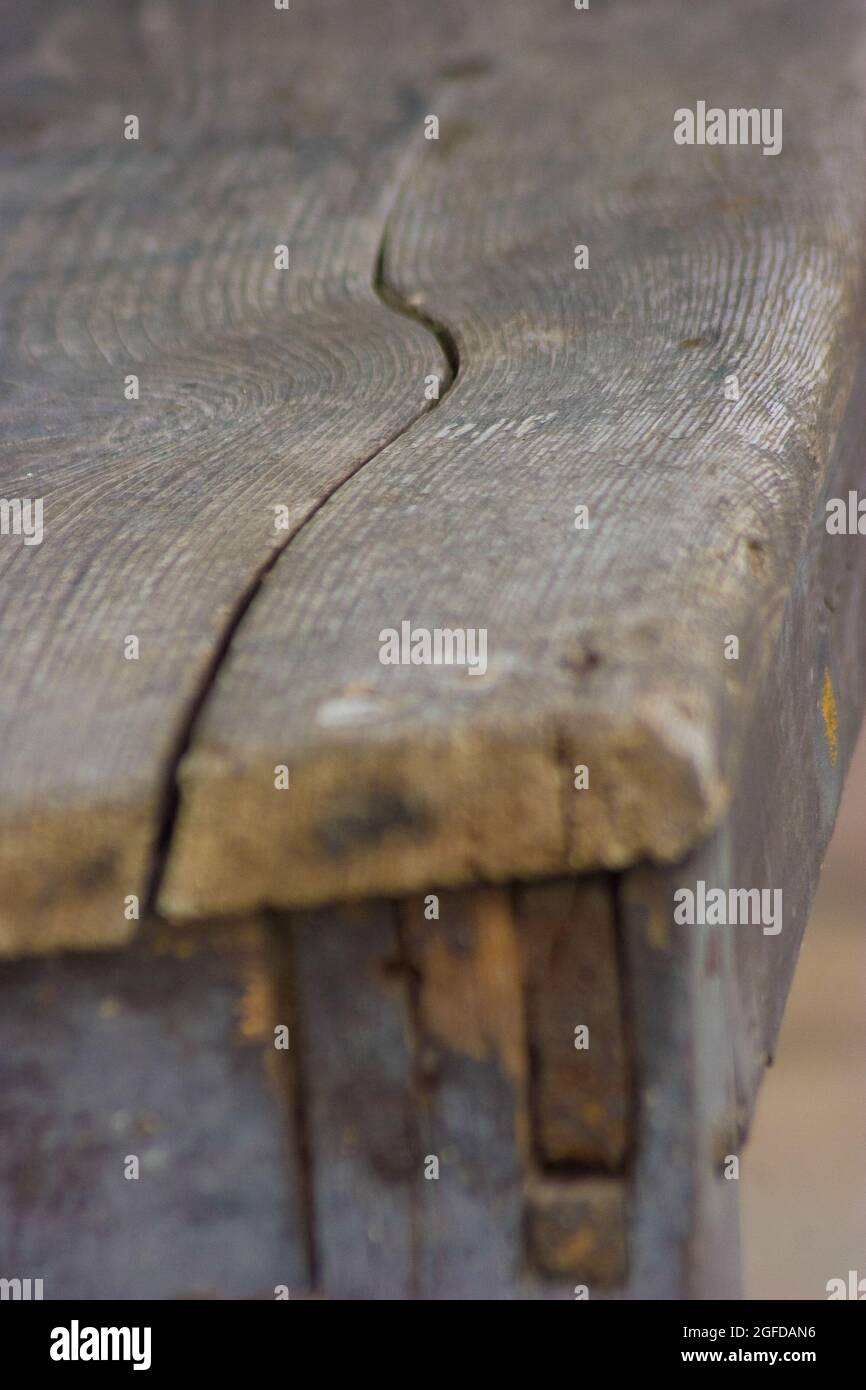Crack on rustic wooden surface of an old table Stock Photo - Alamy