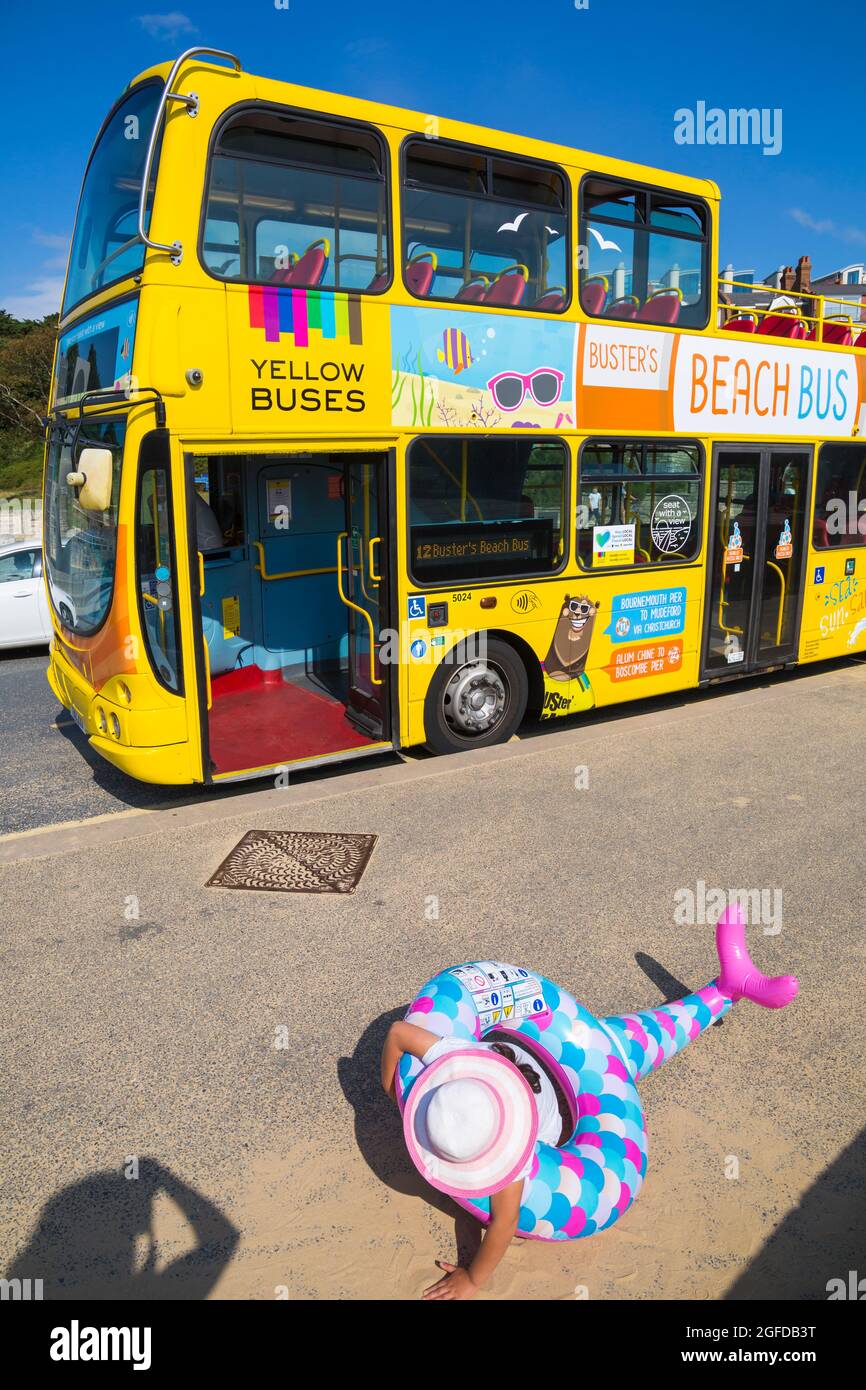 Busters beach bus Yellow buses bus stopped at Boscombe Pier, Dorset UK ...