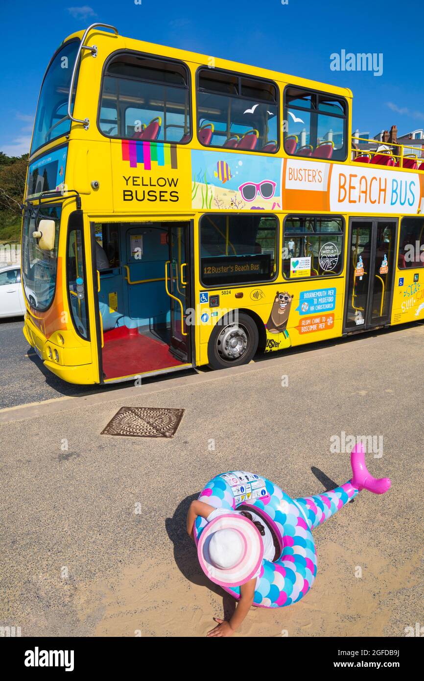 Busters beach bus Yellow buses bus stopped at Boscombe Pier, Dorset UK ...