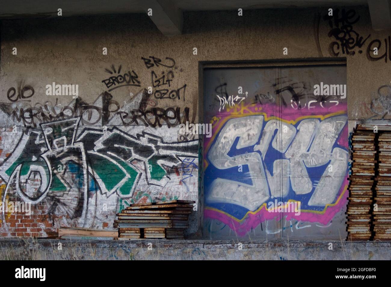 Colorful graffiti on the wall, industrial zone, underground in Hungary ...