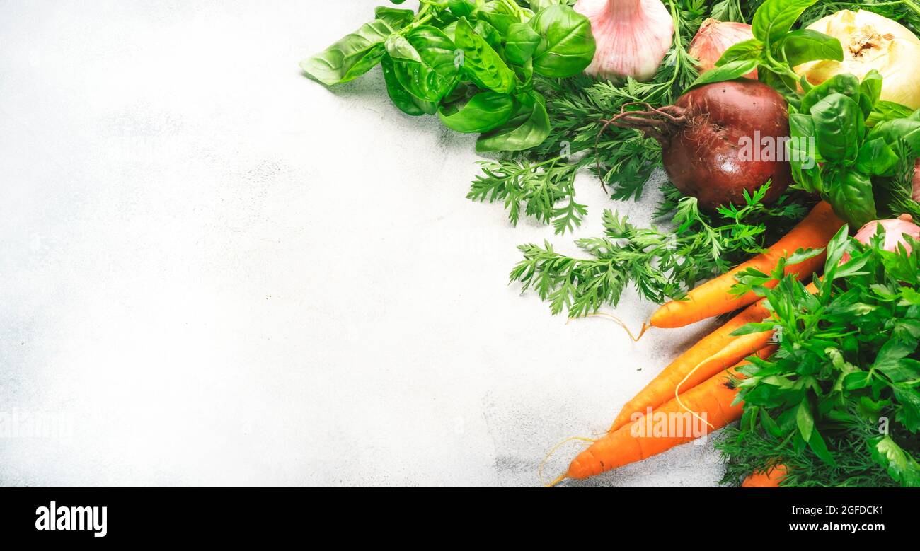 Fresh root vegetables and herbs. Healthy food, autumn cooking concept ...