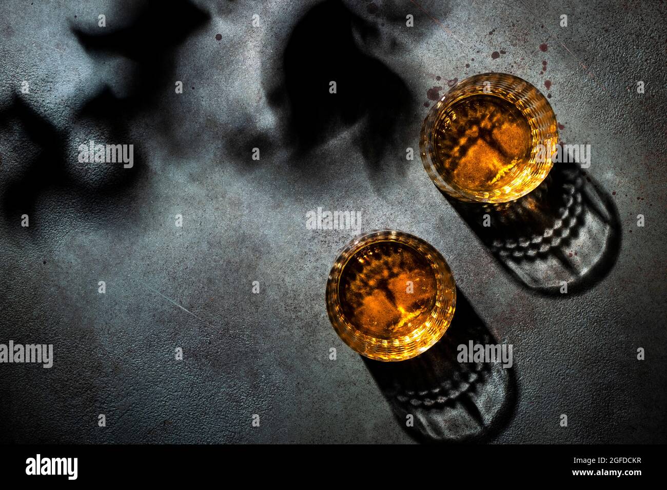 American bourbon whiskey in glasses, black background with shadow ...