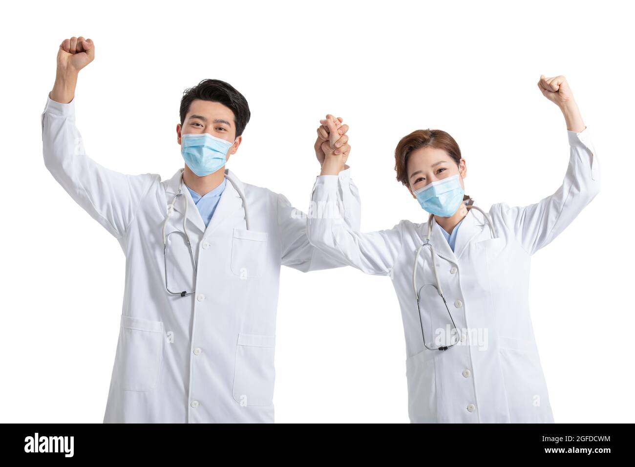 Doctor face mask holding Cut Out Stock Images & Pictures - Alamy