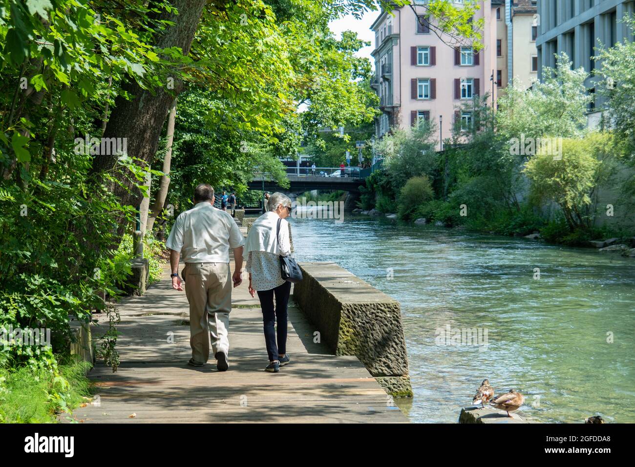 Zürich, Switzerland - July 13th 2019: Pedestrians using a beautiful ...