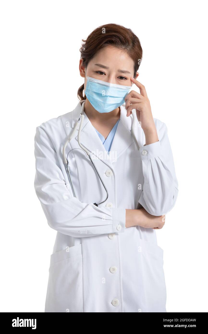 Young doctor thinking Stock Photo - Alamy