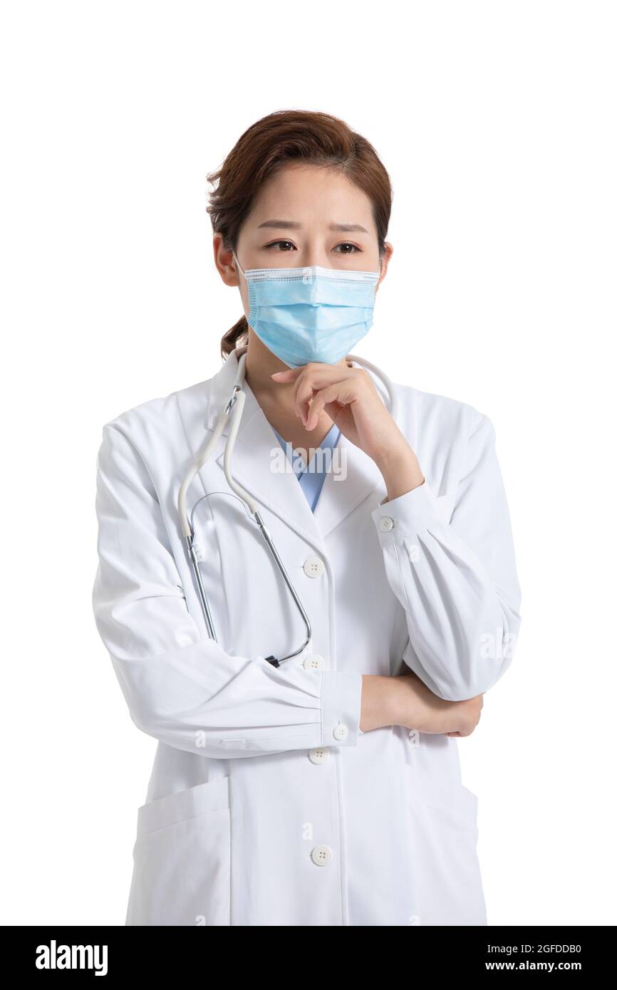 Young doctor standing thinking hi-res stock photography and images - Alamy