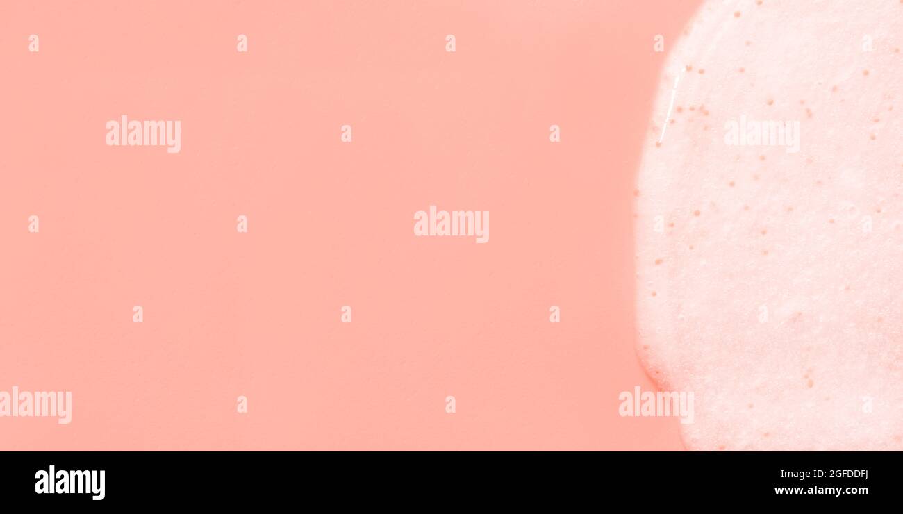 The texture of a scrub or shower gel on a pink background Stock Photo ...
