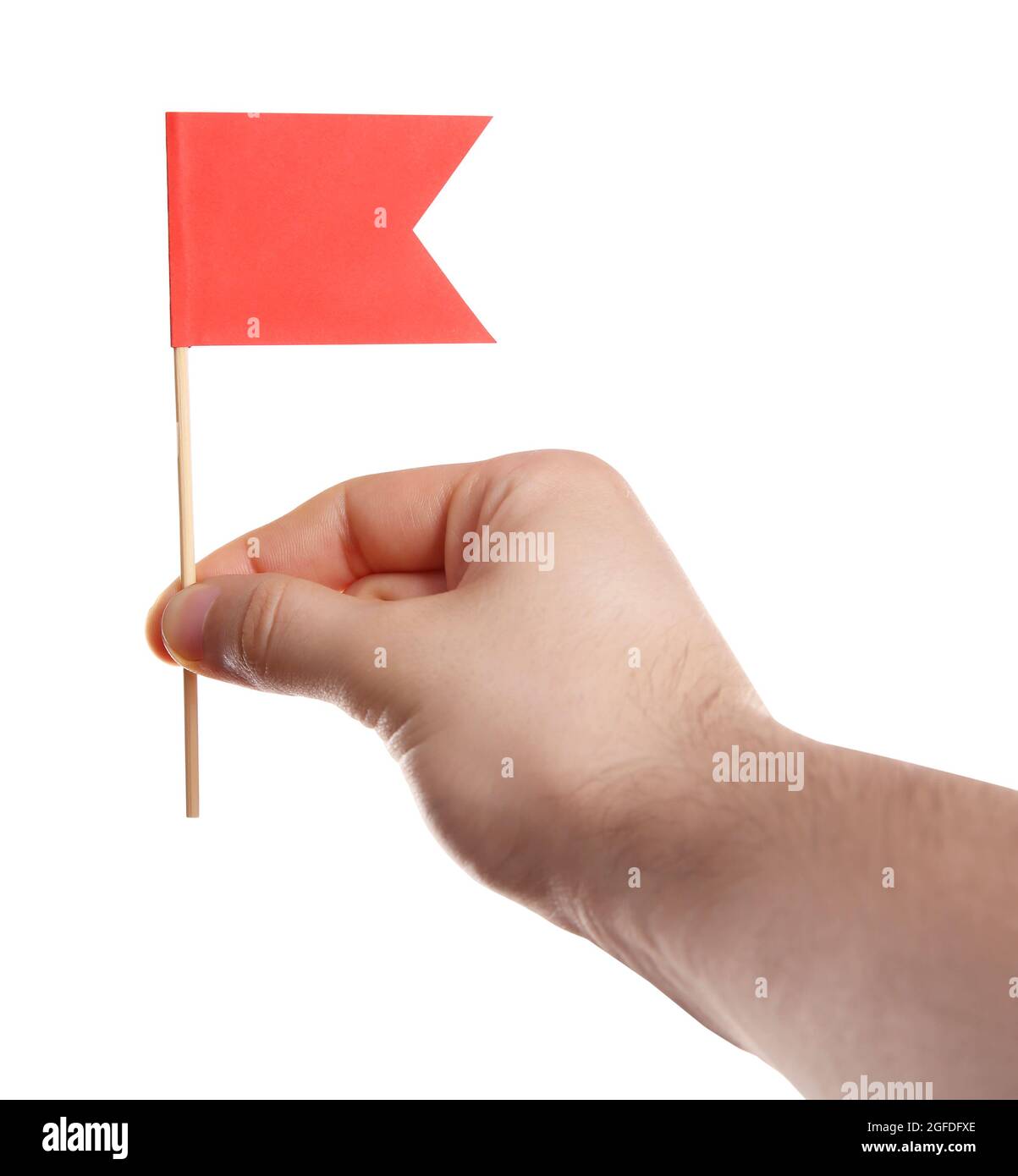 Man hand holding red flag, isolated on white Stock Photo - Alamy