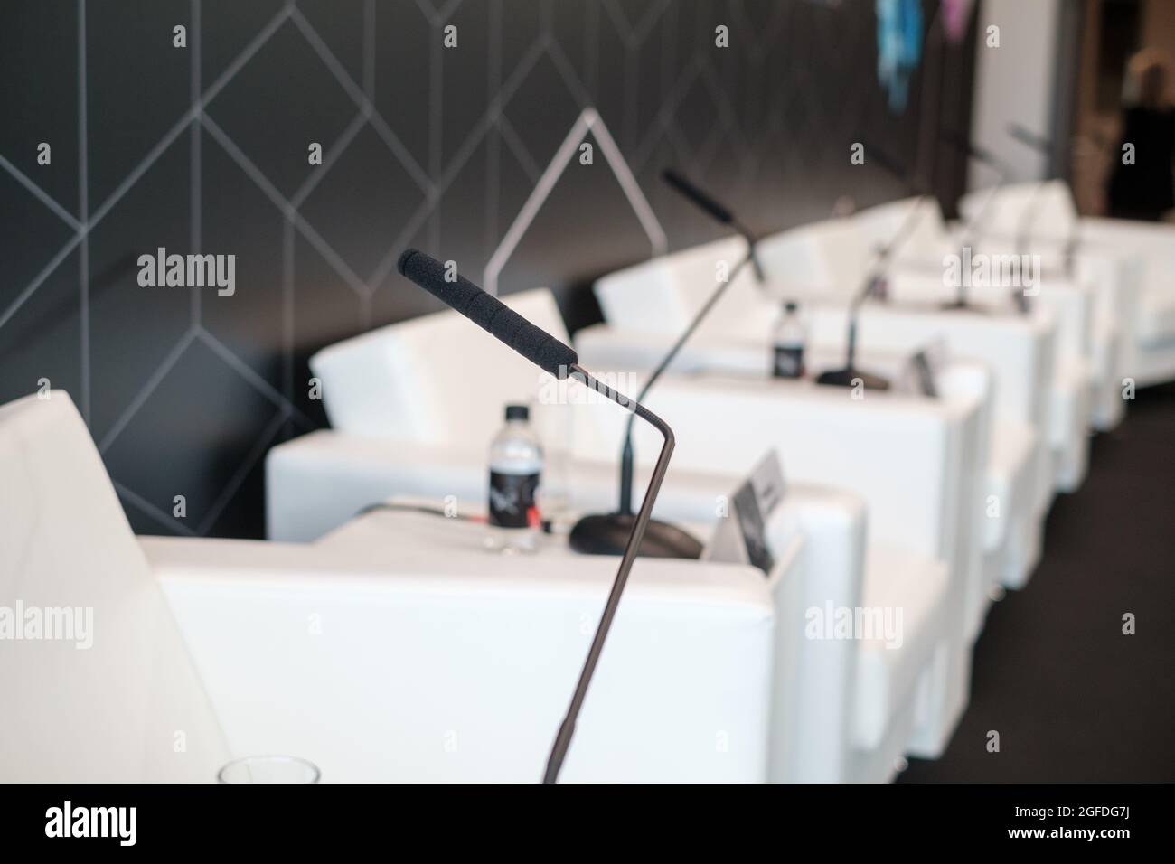 Table microphones at conference hall Stock Photo - Alamy