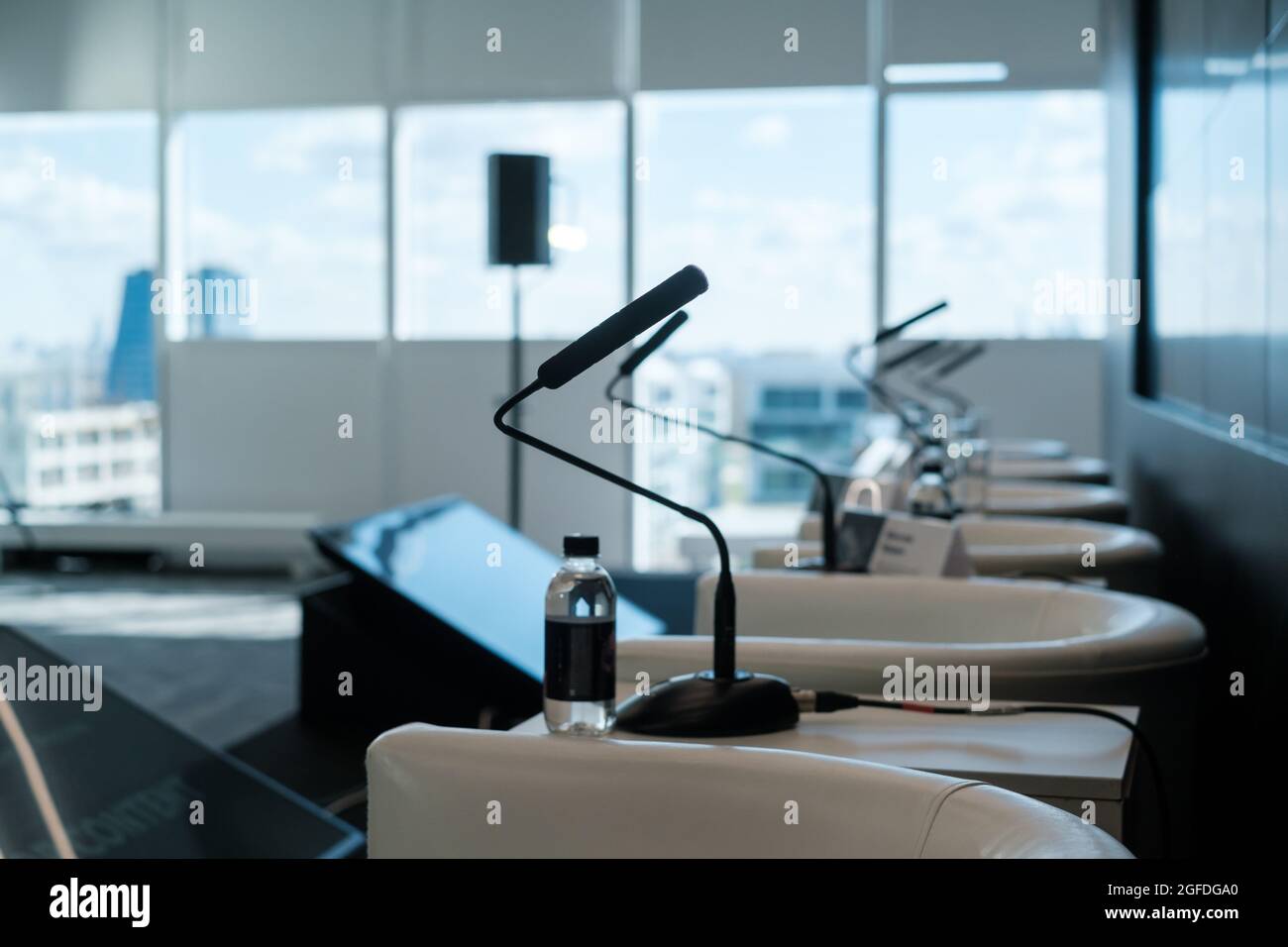 Table microphones at conference hall Stock Photo - Alamy