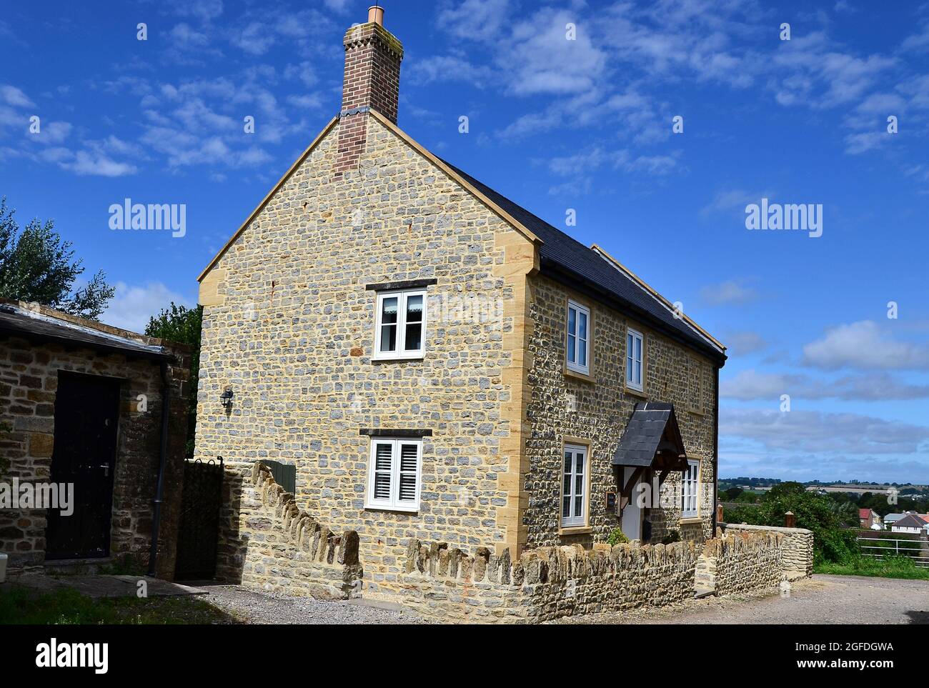 Stone cottage in Yetminster High Street in Dorset UK Stock Photo - Alamy