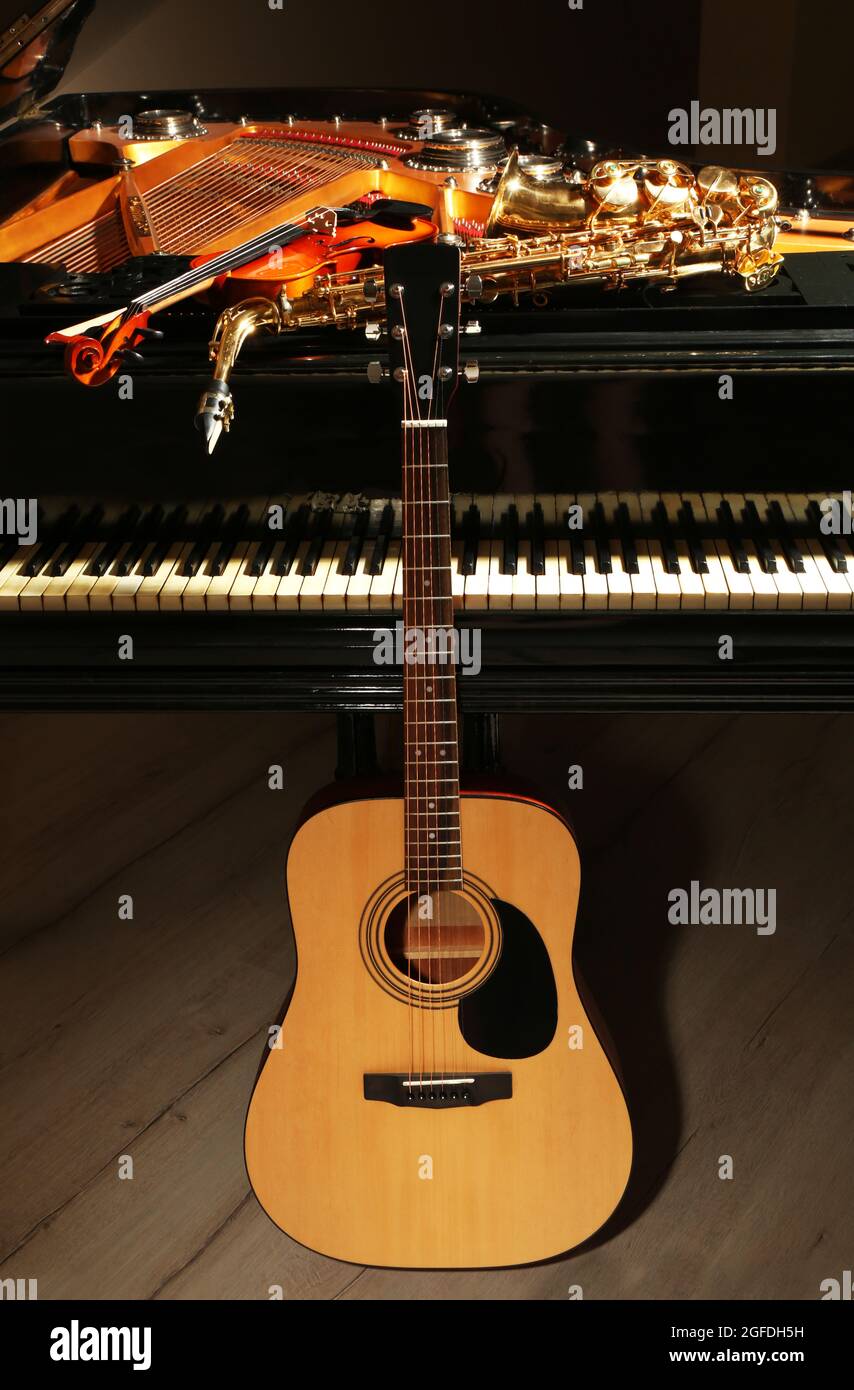 Violin with saxophone, guitar and piano Stock Photo - Alamy