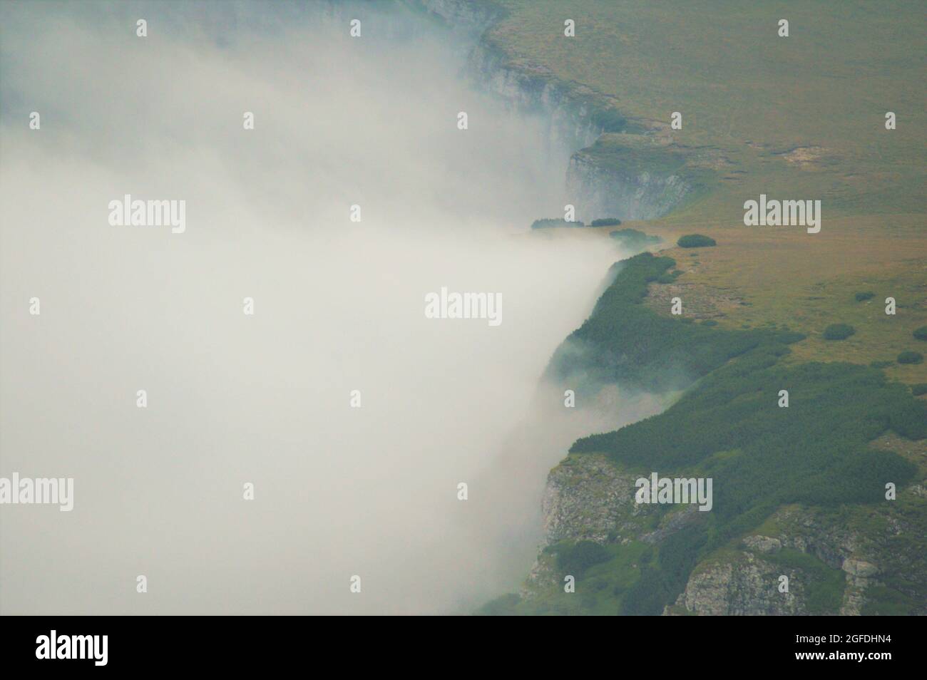 View of fog over the precipice Stock Photo - Alamy