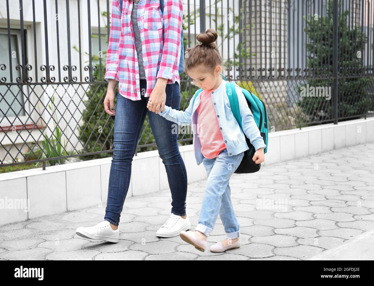 Parent taking child to school Stock Photo - Alamy