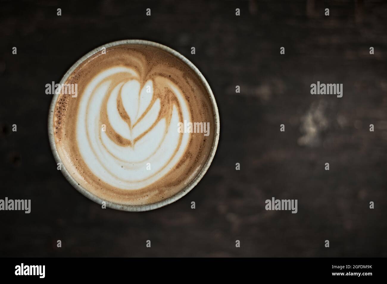 Selective focus cup of hot latte art coffee,focus at white foam Stock ...