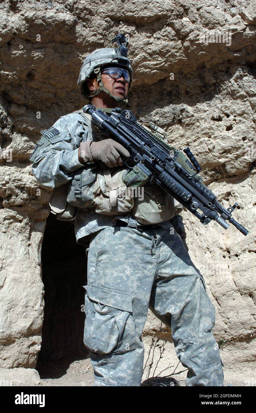 Spc. Ham from Charlie Company, 2/87 Infantry, stands guard outside a ...