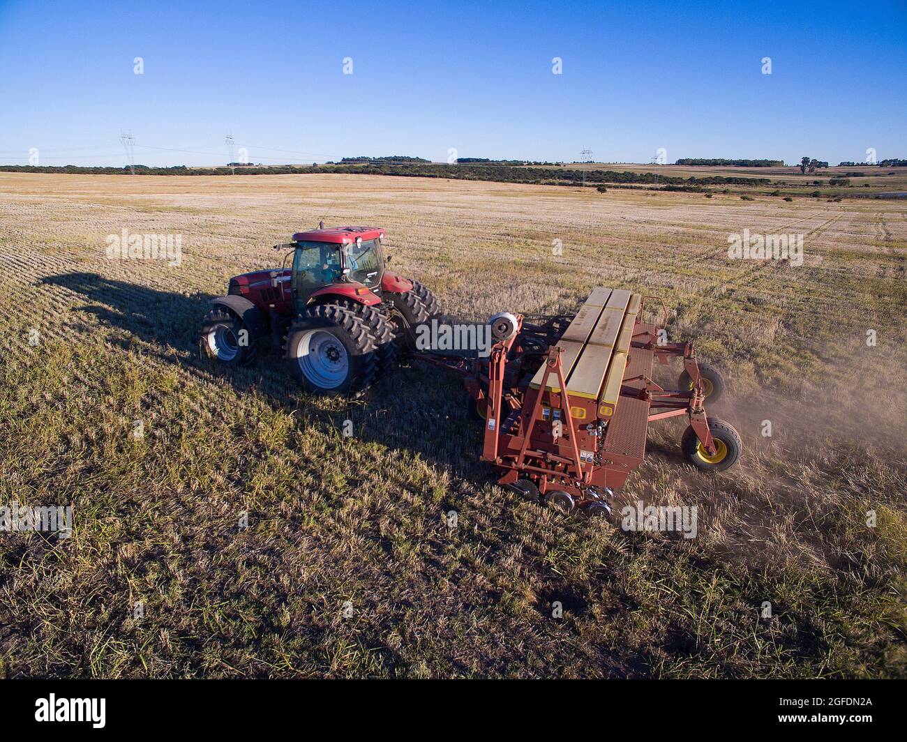 Aerial view of a tractor in direct sowing, in the Argentine field, La ...