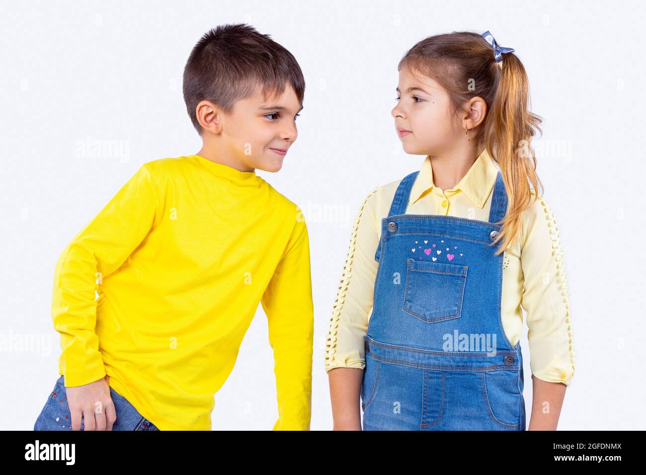 Smart good looking boy leaned over to the girl and wants to say several ...