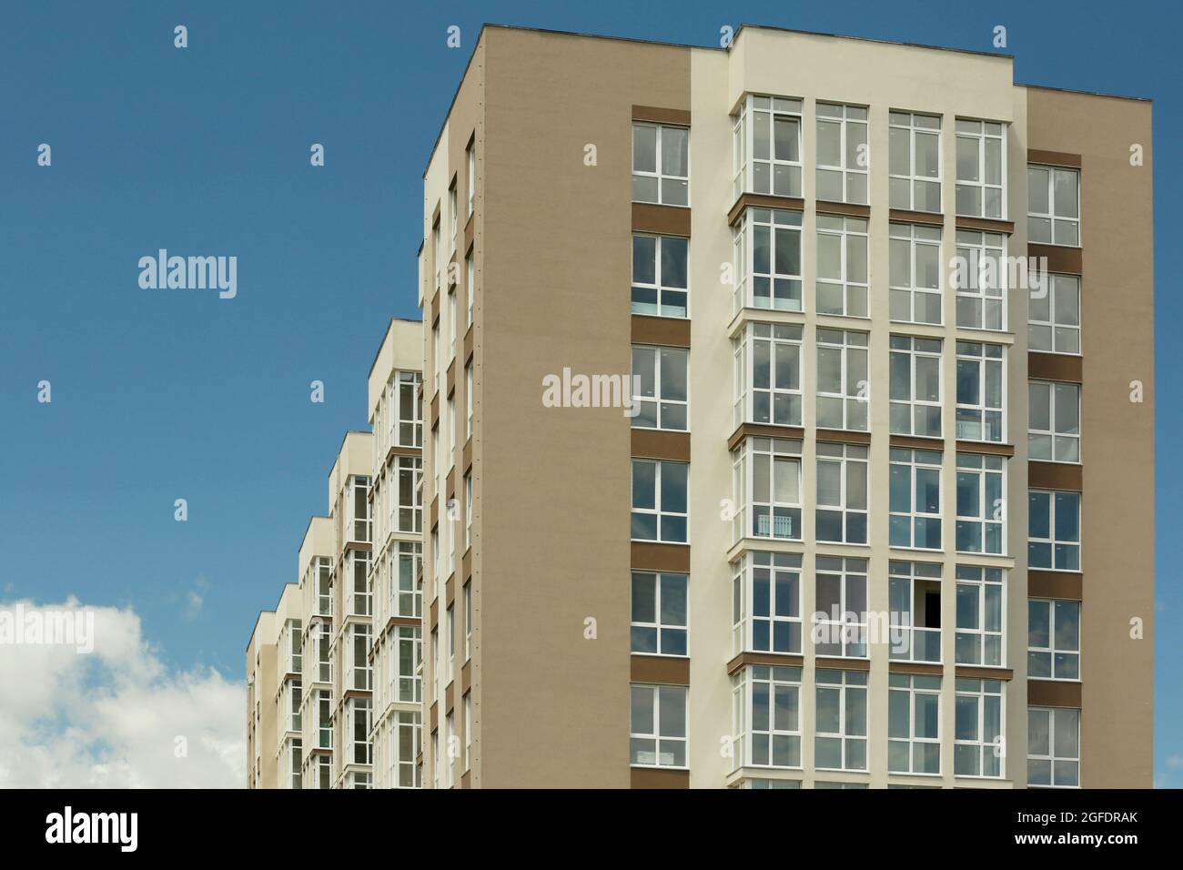 Building construction on sky background Stock Photo - Alamy