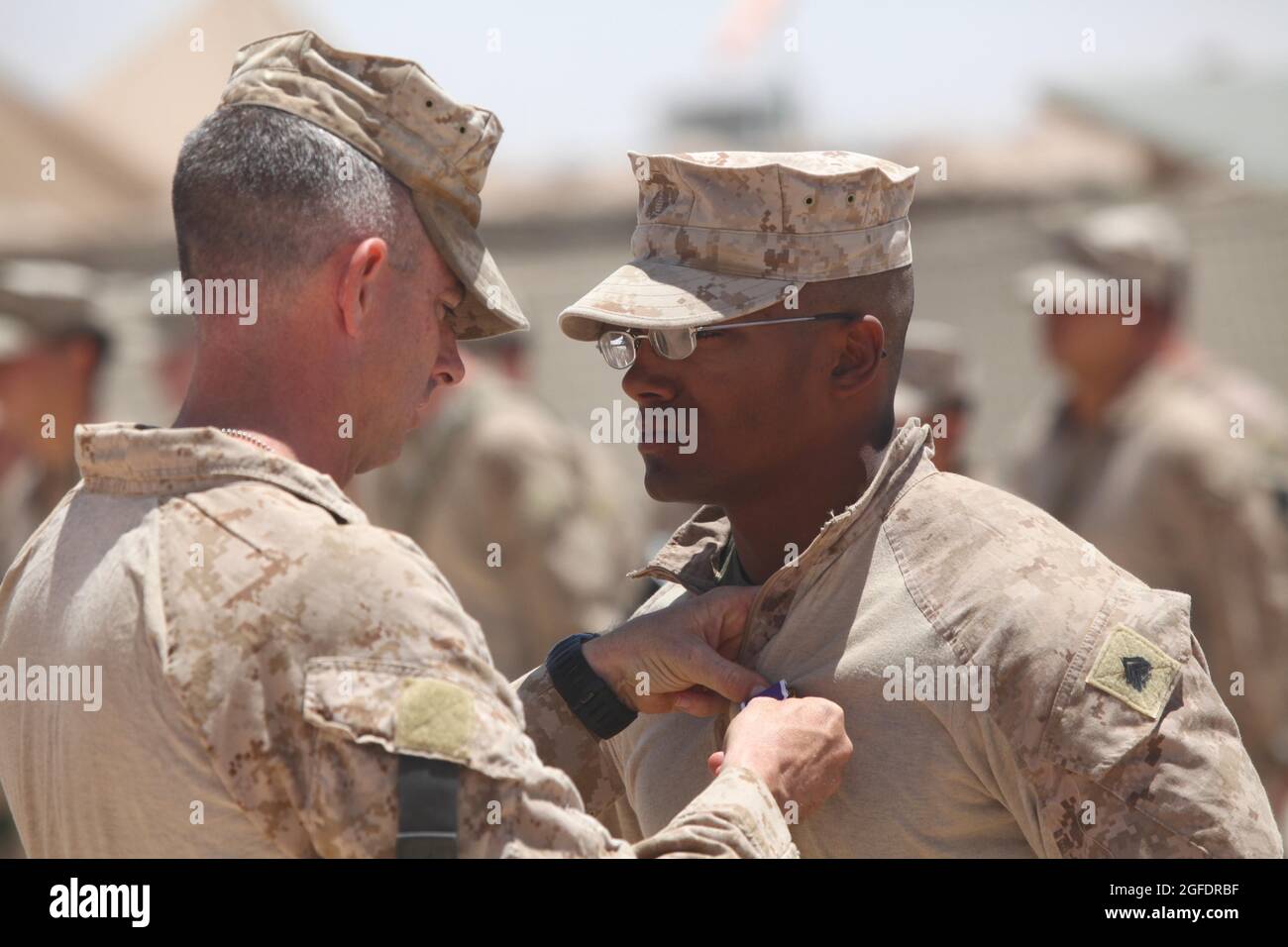 U.S. Marine Corps Sgt. Ian Snarr, right, with Echo Company, 2nd ...