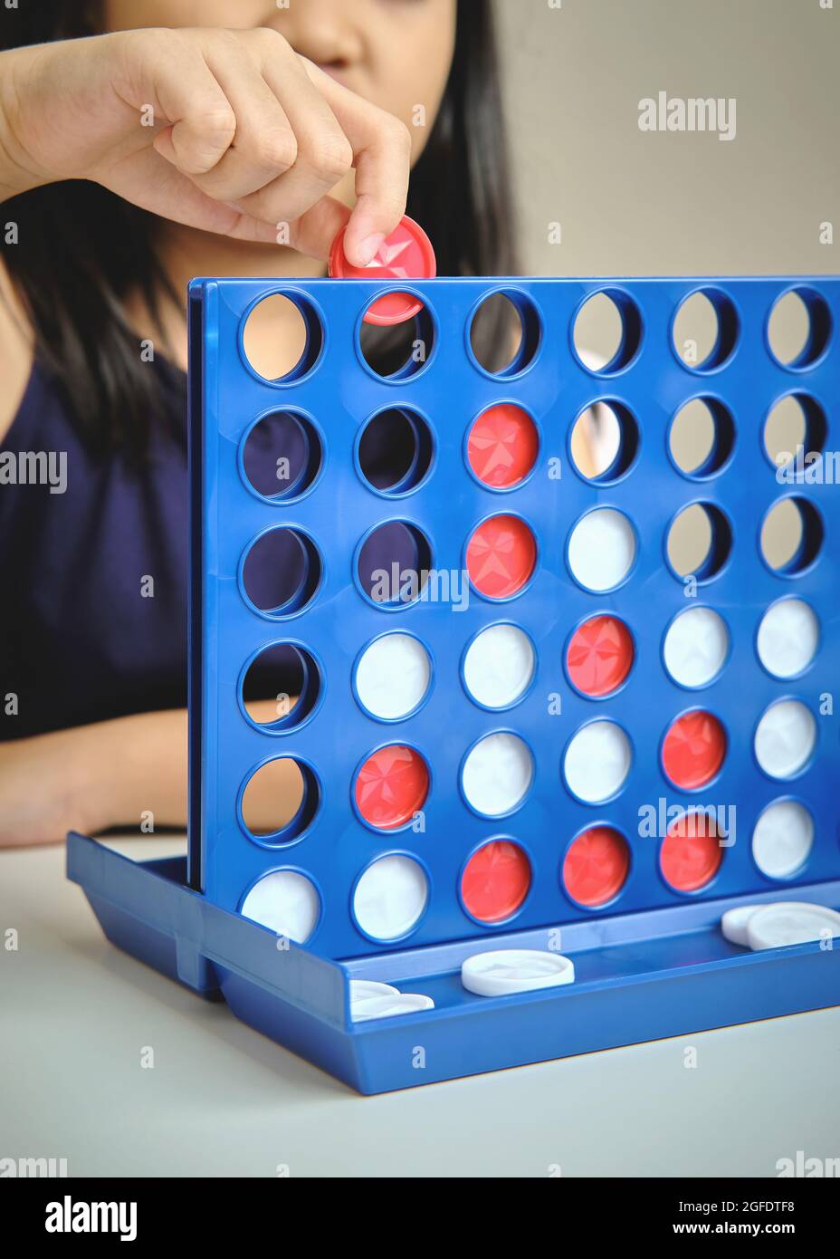 Little Girl Playing Four In A Row, 4 In Line Game, Game Education Toys ...