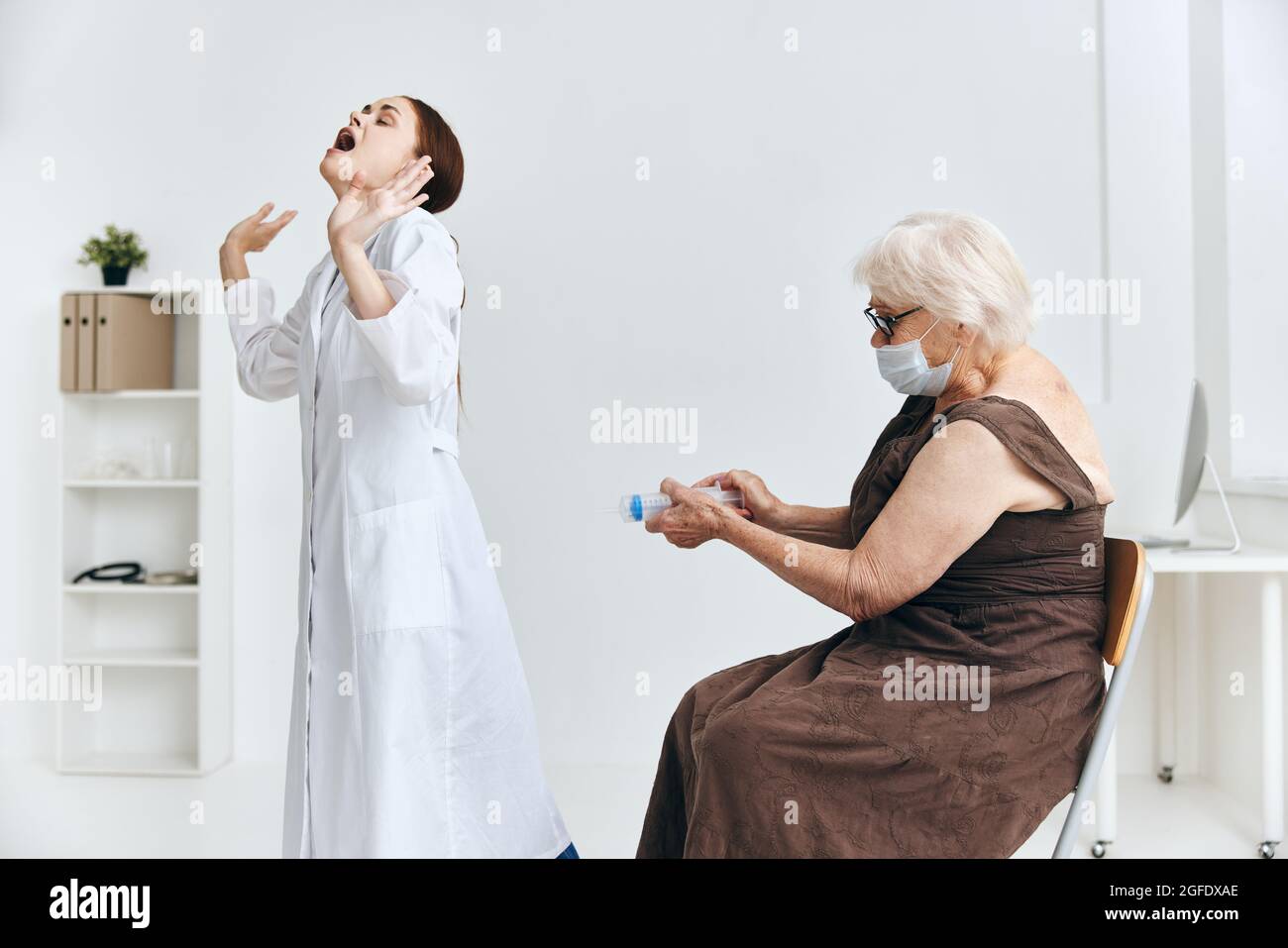 Nurse Injection Older Woman Big Syringe Fun Stock Photo - Alamy