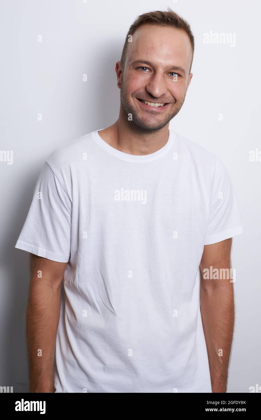 Man smiling in a white background Stock Photo - Alamy