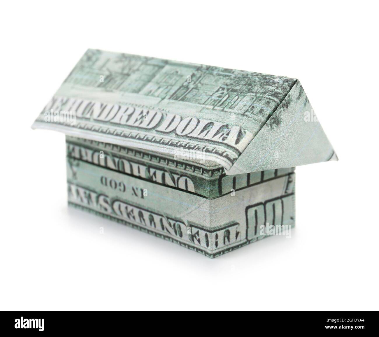 Dollar house isolated on white Stock Photo - Alamy