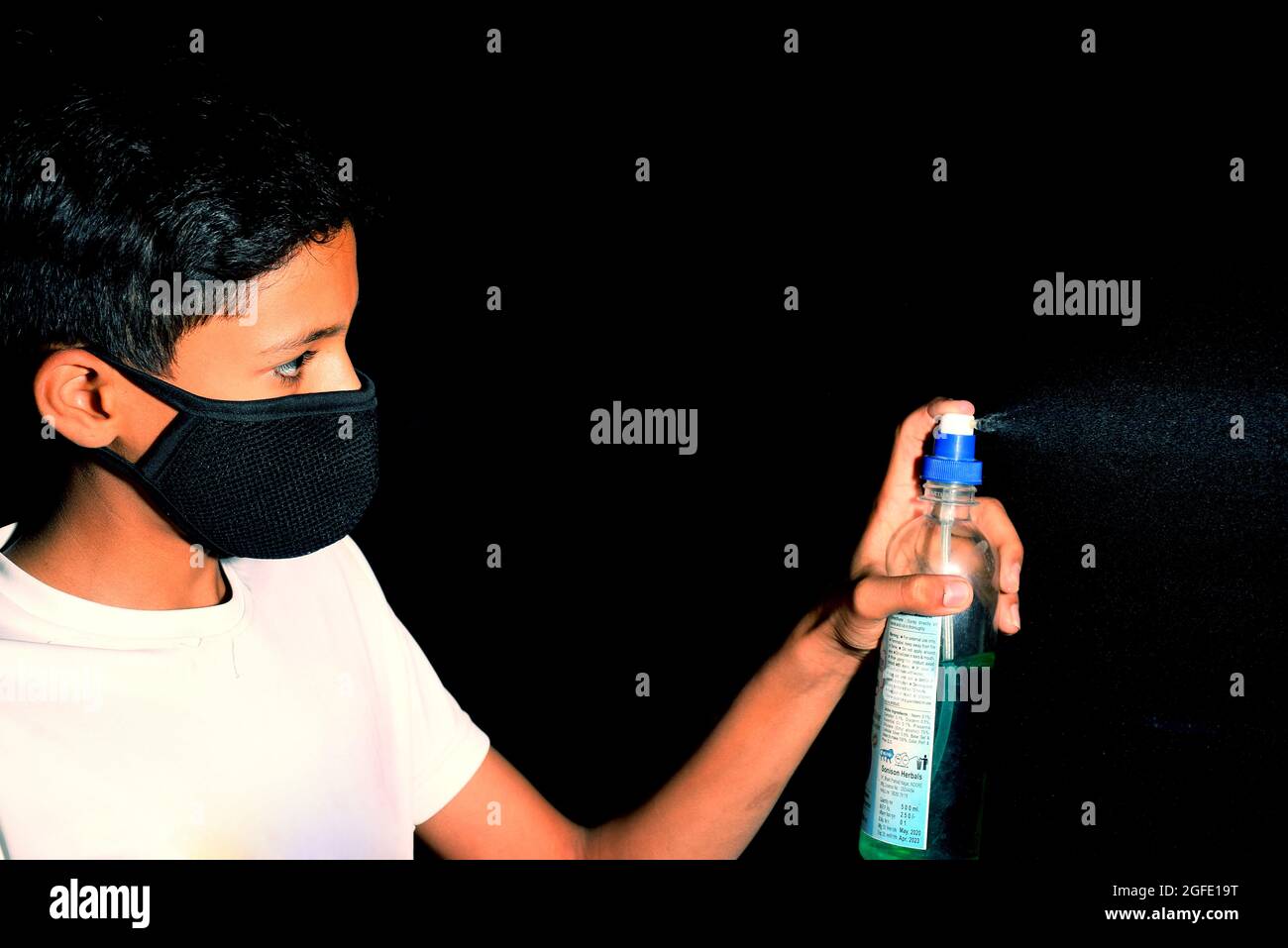 boy with alcohol gel or antibacterial soap sanitizer.Hygiene concept ...