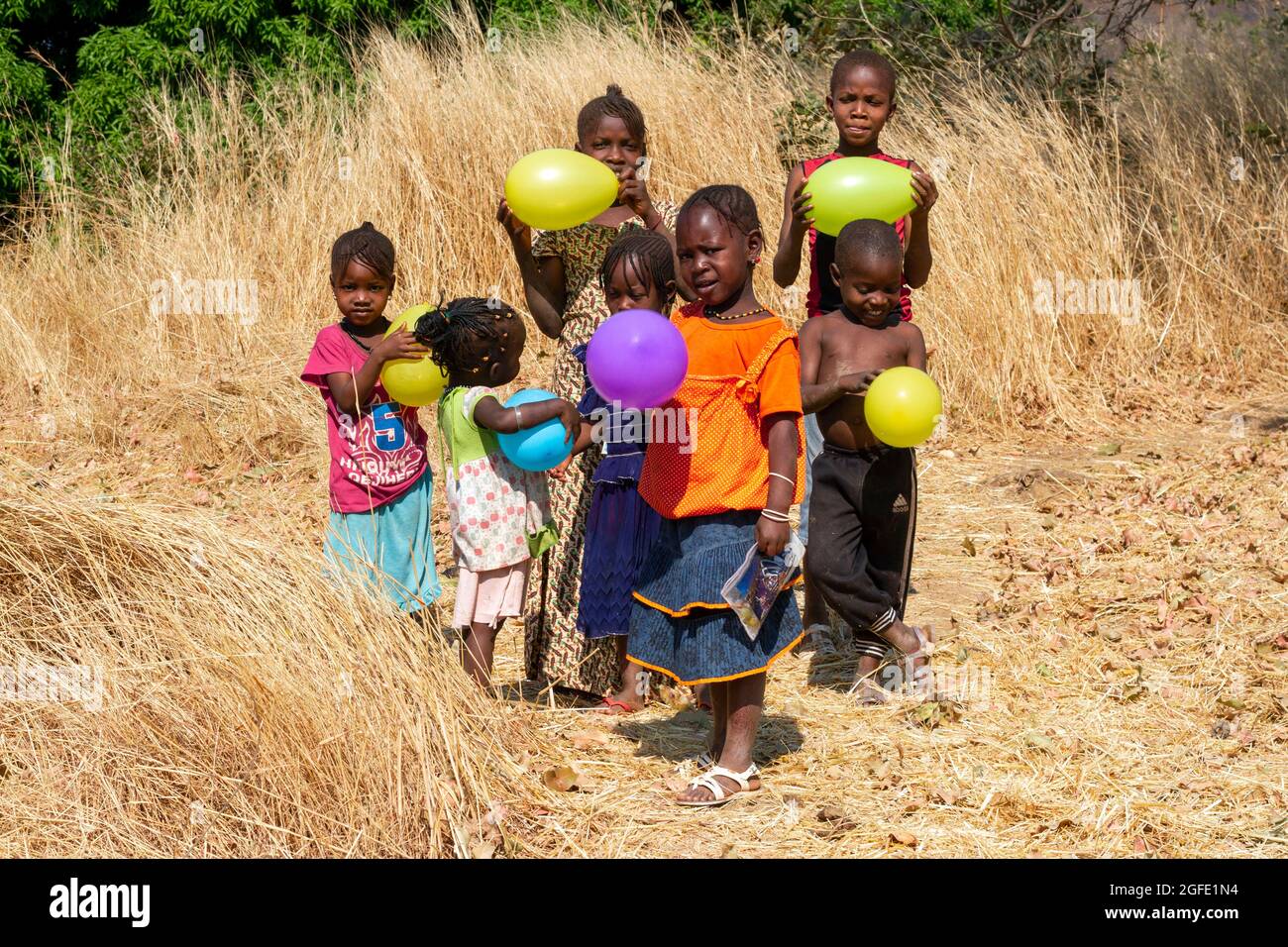A GROUP OF AFRICAN CHILDREN PLAY WITH INFLATABLES BALLS Stock Photo - Alamy