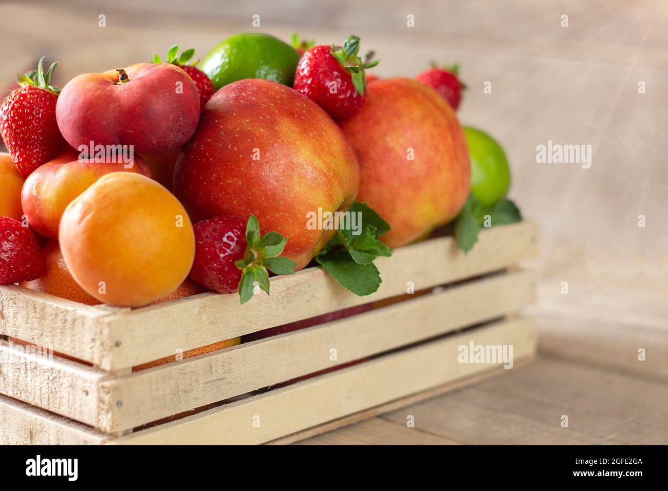 Fresh fruits. Healthy food. Mixed fruit, apricots and peaches. Studio ...
