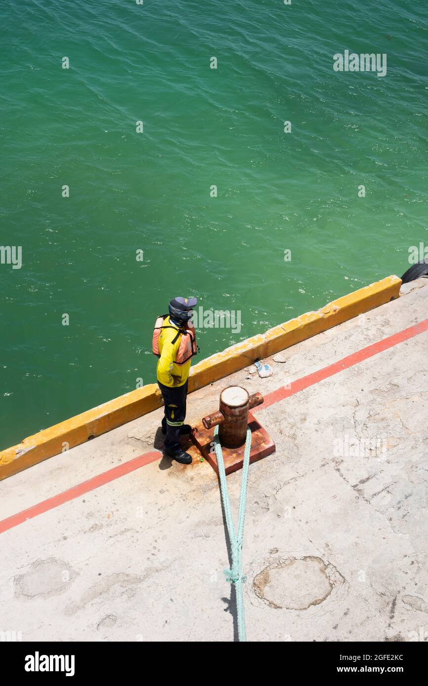 A mooring operator in charge of the safety of the navigation of the ...