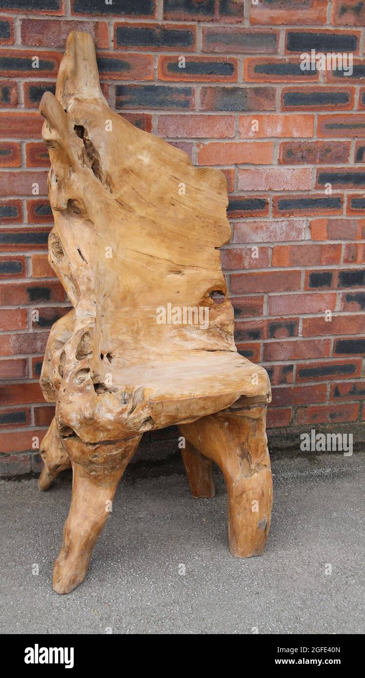 An Unusual Chair Made from Natural Wood Stock Photo - Alamy