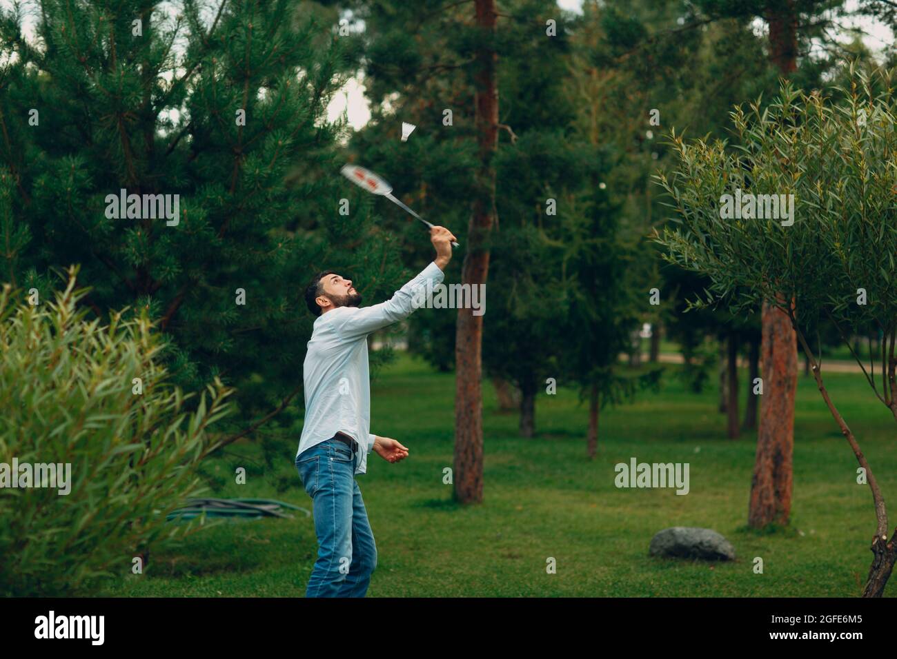 Man playing badminton hi-res stock photography and images - Alamy