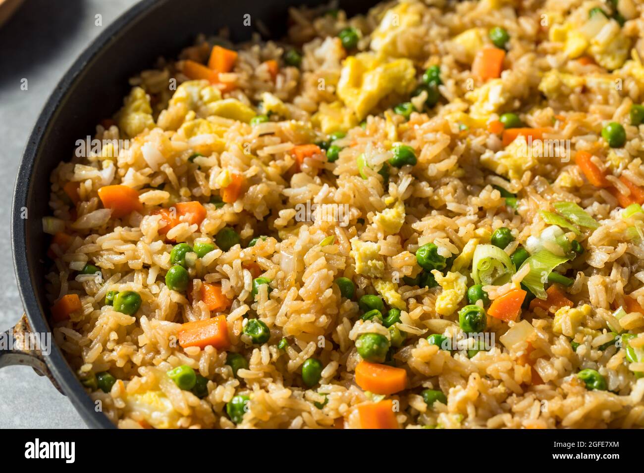 Homemade Chinese Fried Rice with Eggs Carrots and Peas Stock Photo - Alamy
