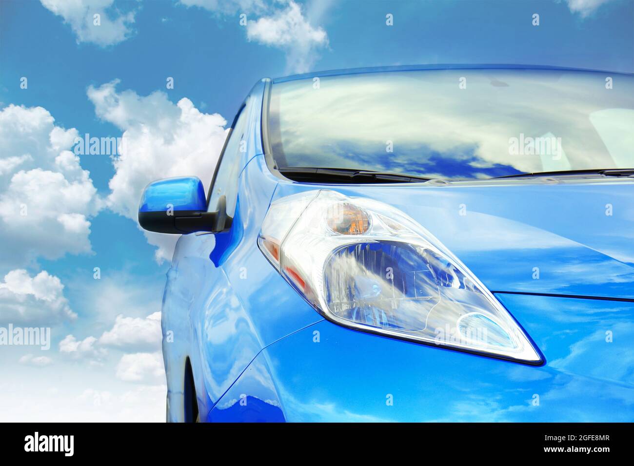 Car on sky background Stock Photo - Alamy