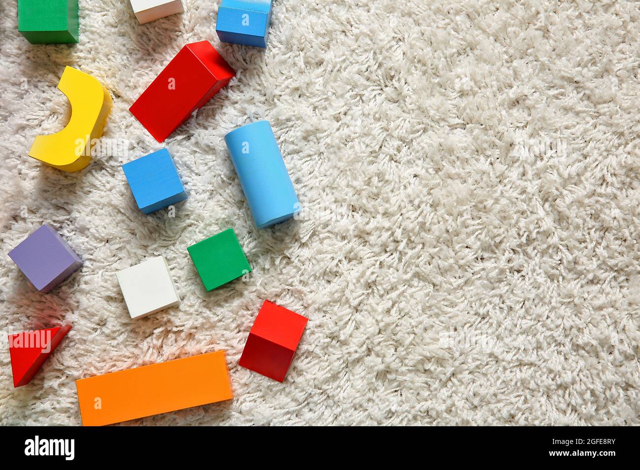 Set of wooden colorful building blocks, top view Stock Photo - Alamy
