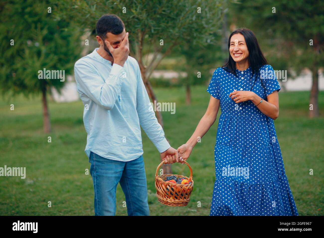 Woman fruits basket walking hi-res stock photography and images - Alamy
