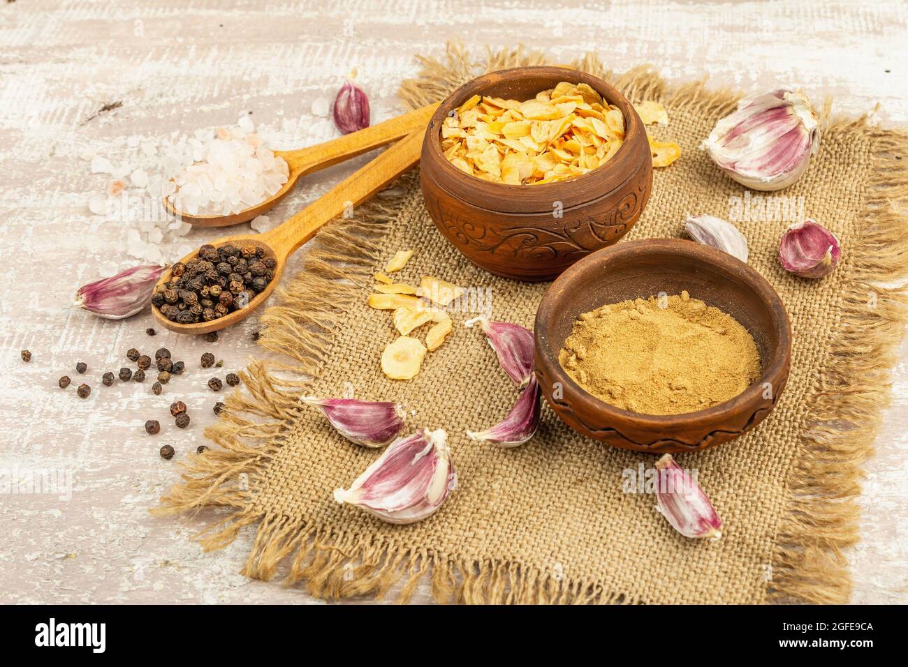 Fresh garlic and its products: dried chunks and powder. Natural ...