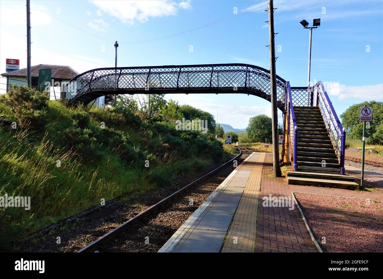 Foot bridge across railway line at Rannoch Station, West Highland ...