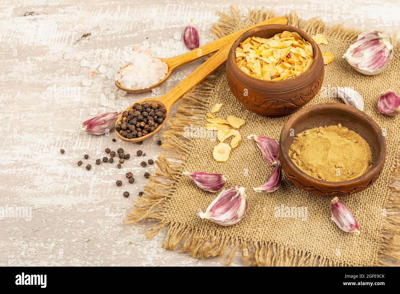 Fresh garlic and its products: dried chunks and powder. Natural ...
