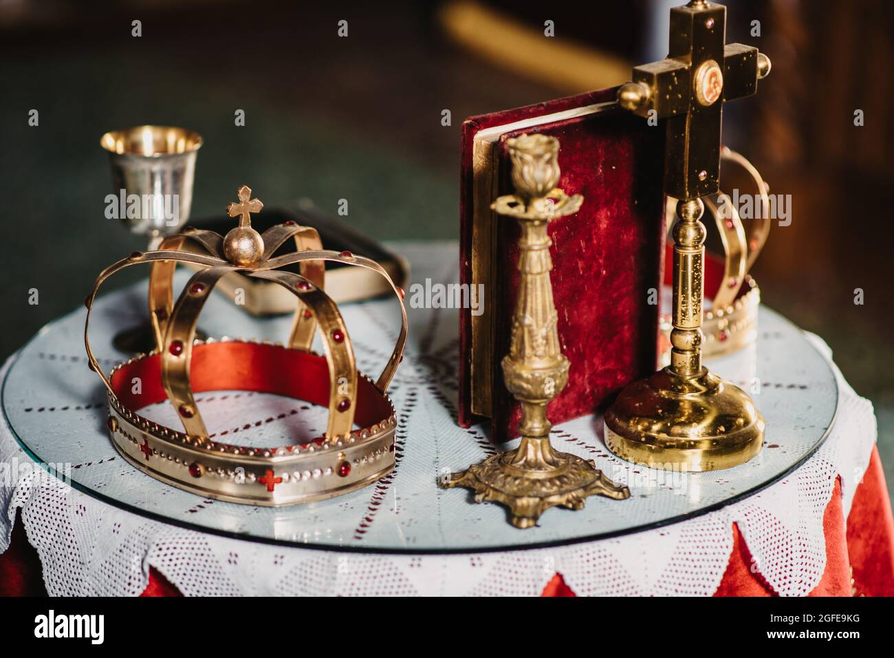 Traditional wedding crowns on the table in church Stock Photo - Alamy