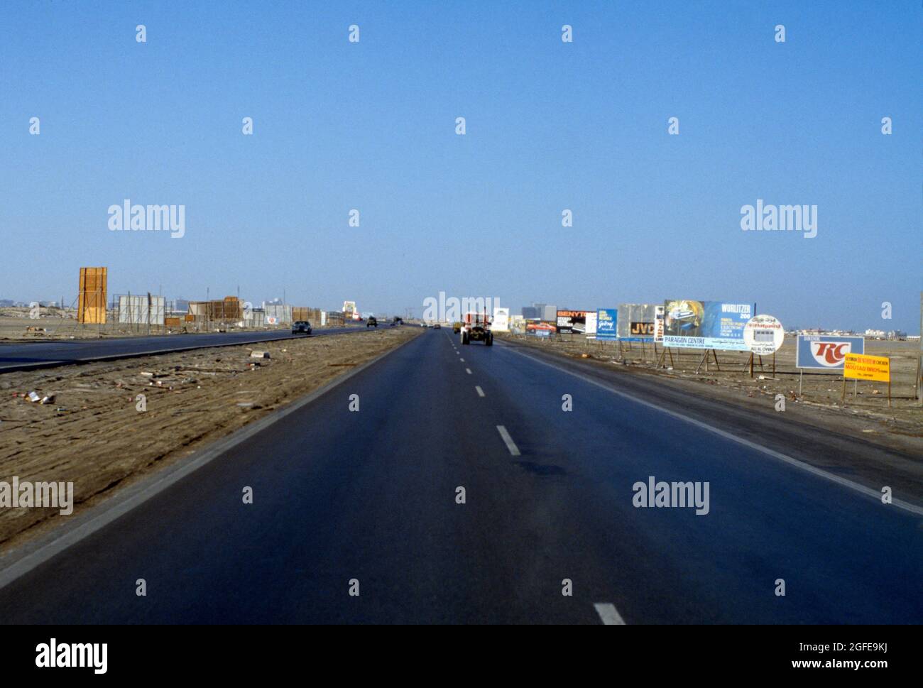 Rubbish in Scrub Desert and Advertising Hoarding alongside Sharjah to ...