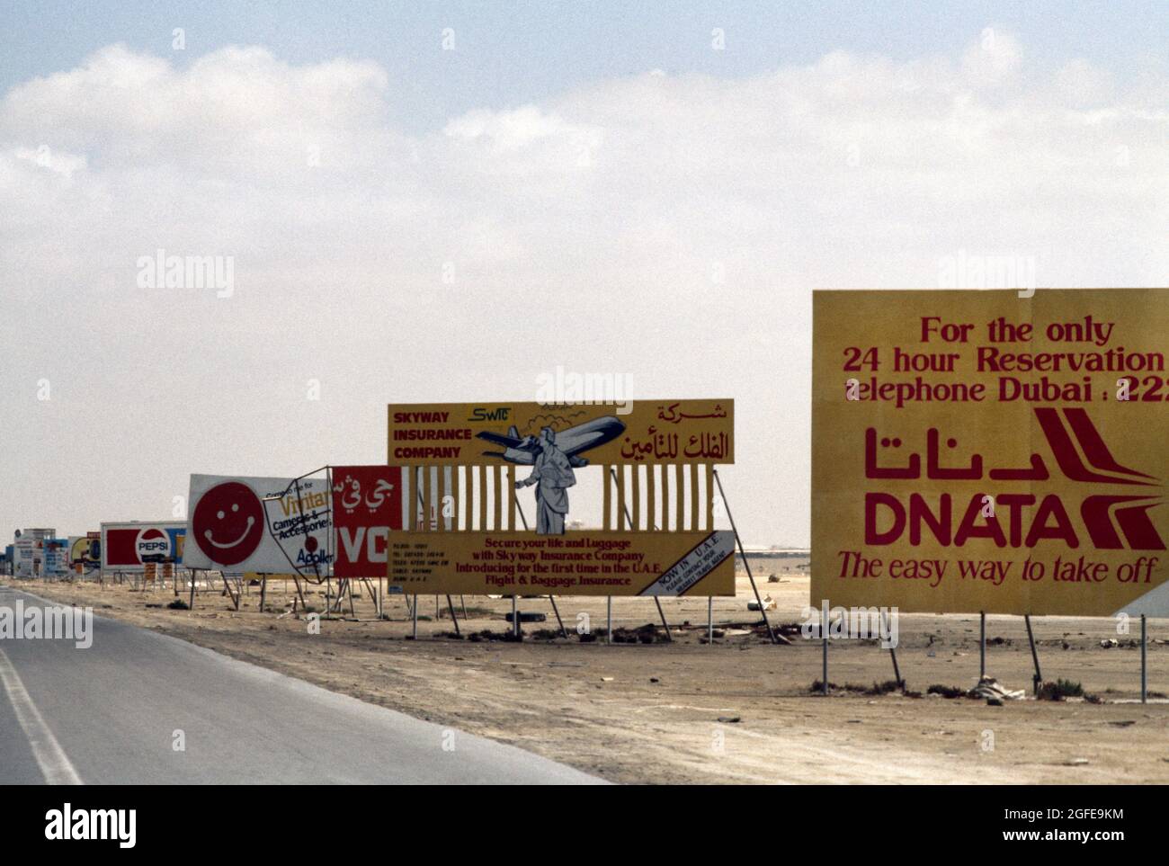 Rubbish in Scrub Desert and Advertising Hoarding alongside Sharjah to ...