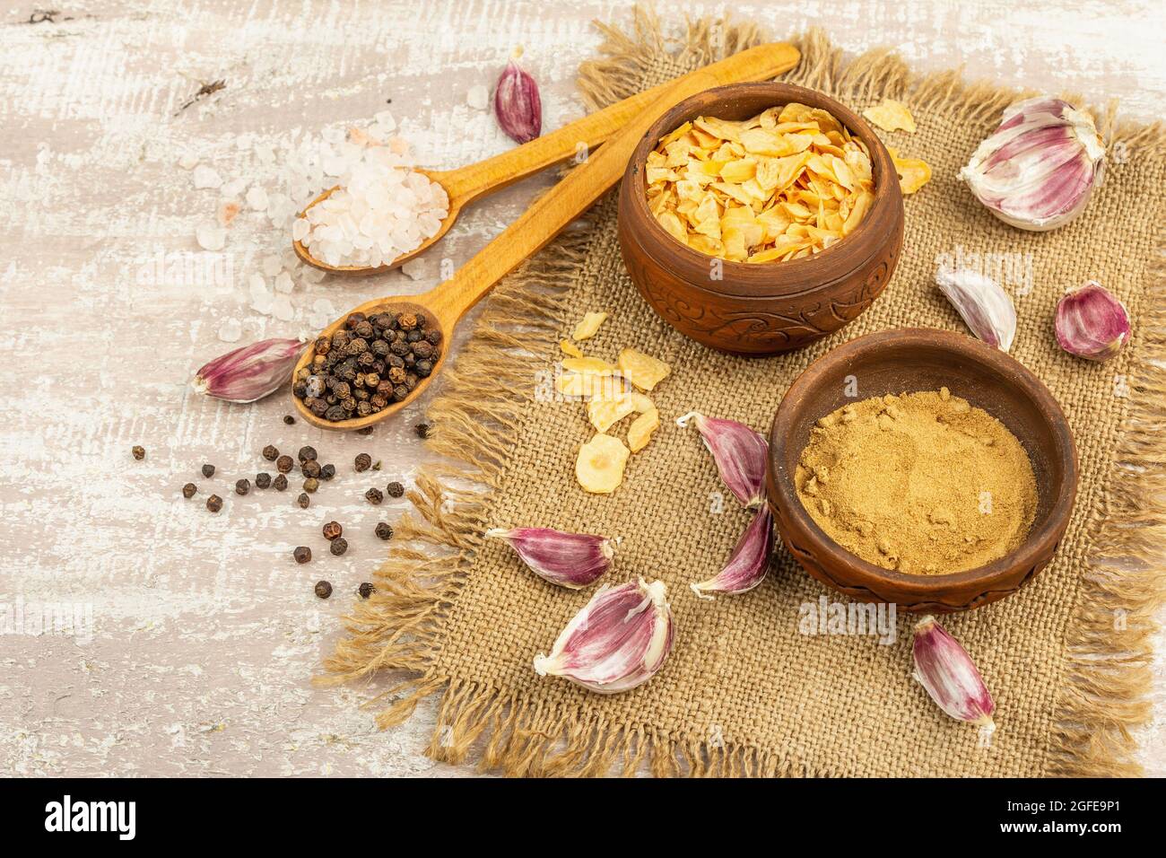 Fresh garlic and its products: dried chunks and powder. Natural ...