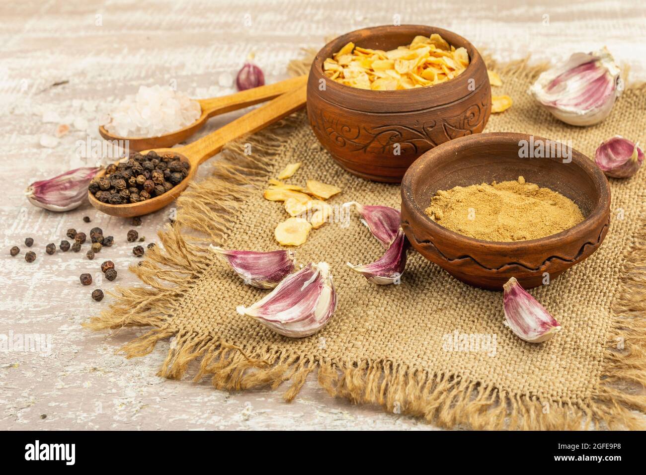 Fresh garlic and its products: dried chunks and powder. Natural ...