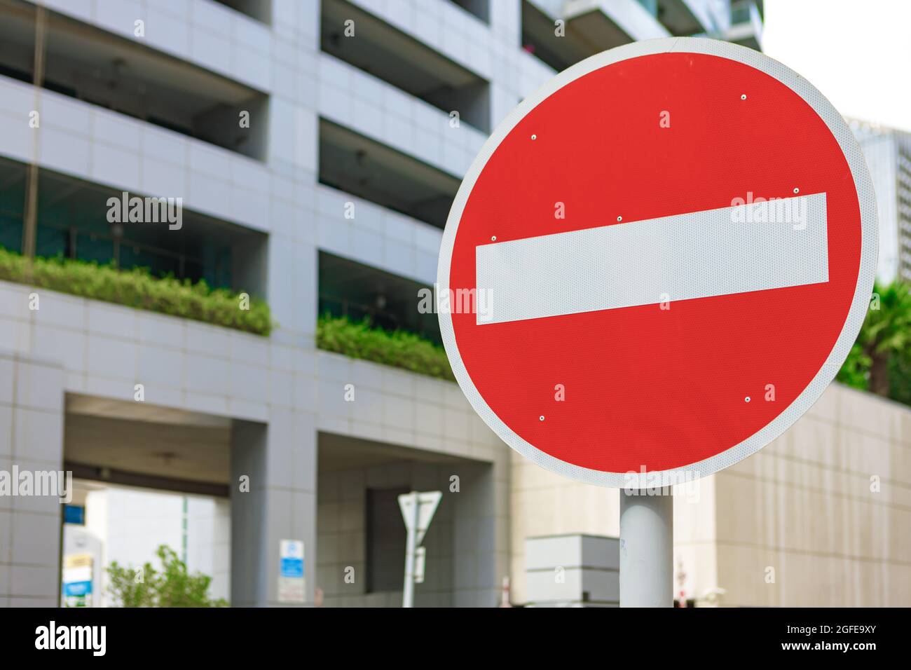 No entry road sign in urban street Stock Photo - Alamy