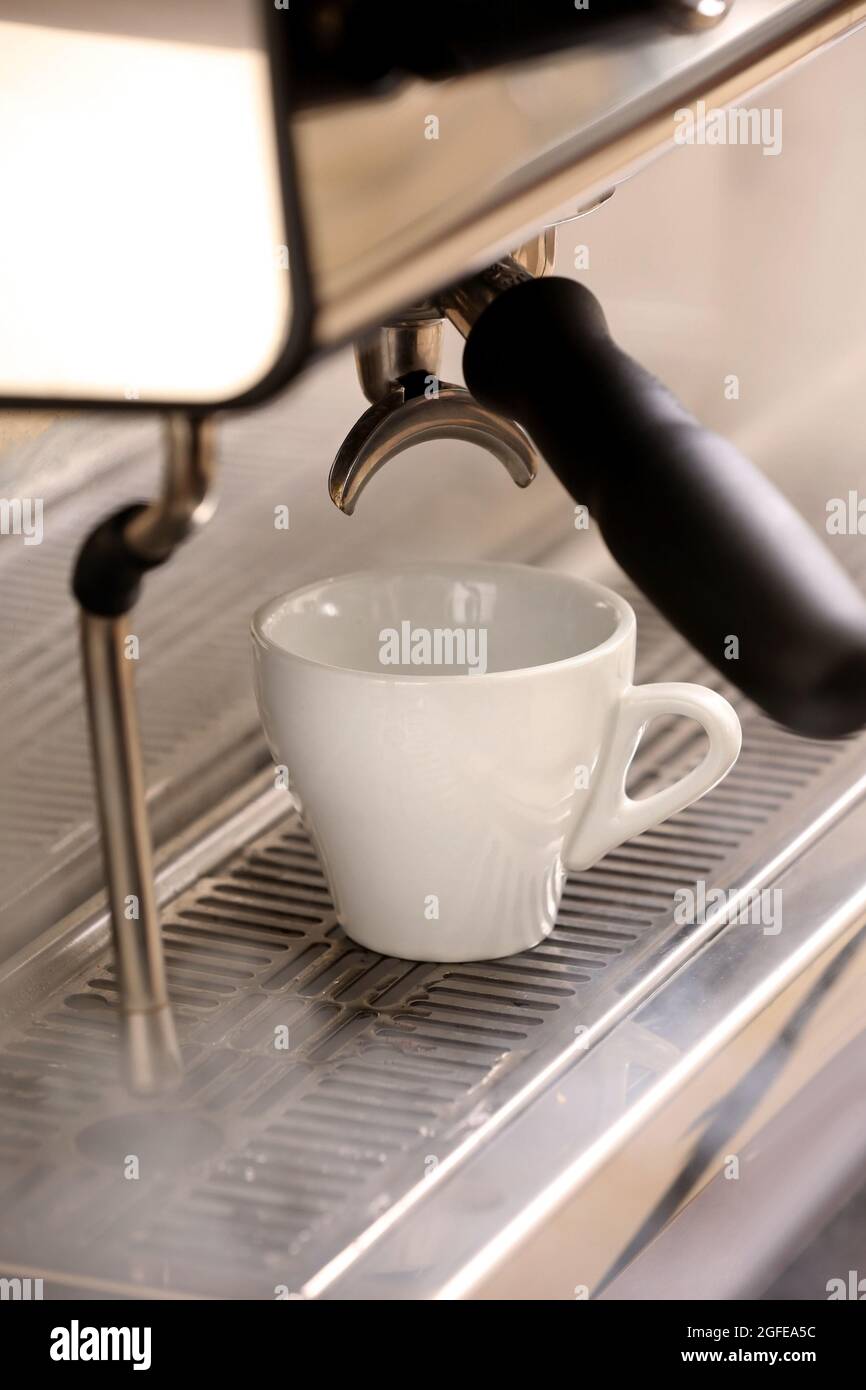 Automatic coffee machine preparing espresso Stock Photo - Alamy