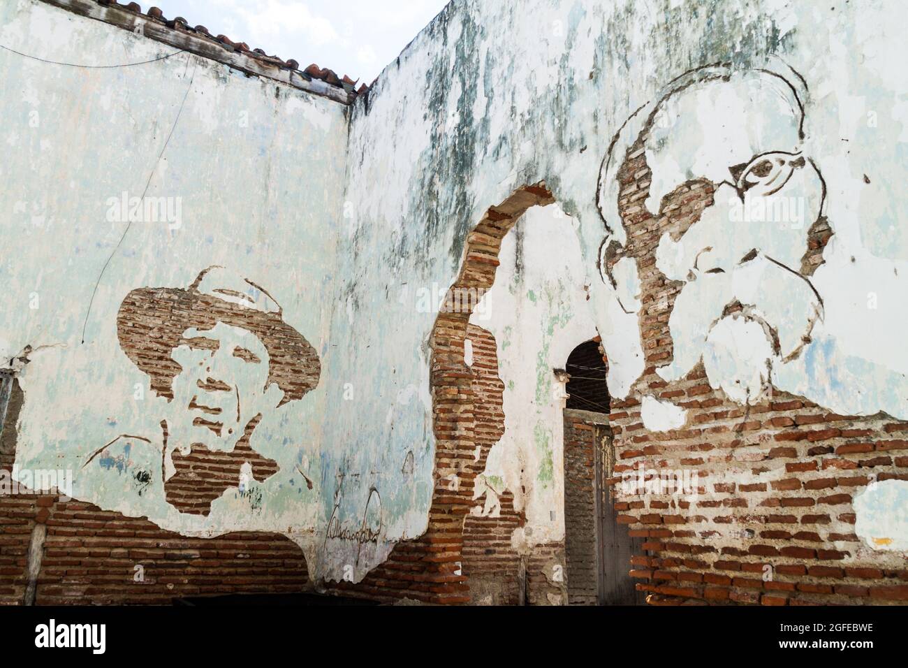 Portraits of cuban heroes (Camilo Cienfuegos and Maximo Gomez) at an ...