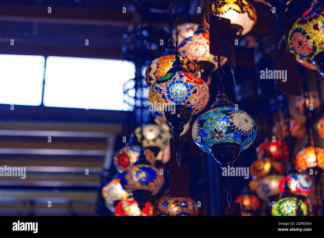 Middle Eastern lamps of different colors hanging in bazaar Stock Photo ...